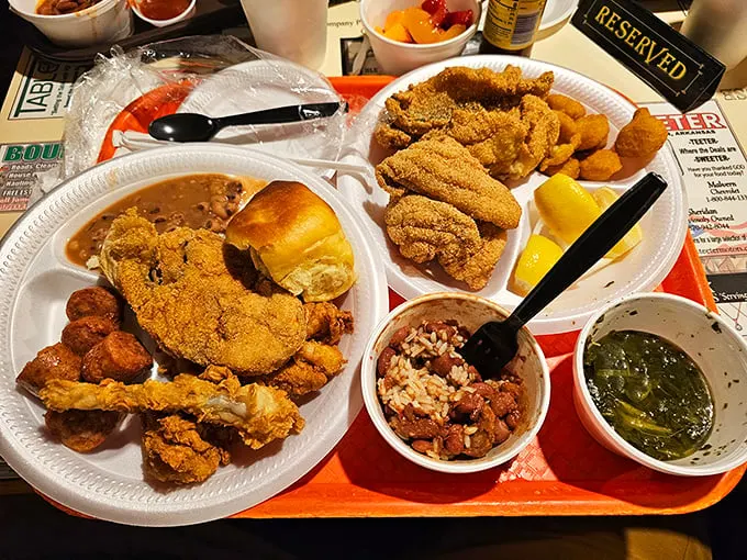 Southern buffet artistry at its finest – two plates barely containing a symphony of fried chicken, sides, and the promise of a glorious food coma.