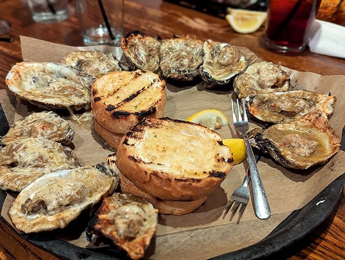 Oysters on the half shell surrounded by grilled bread—nature's perfect delivery system for soaking up every last drop of briny goodness.
