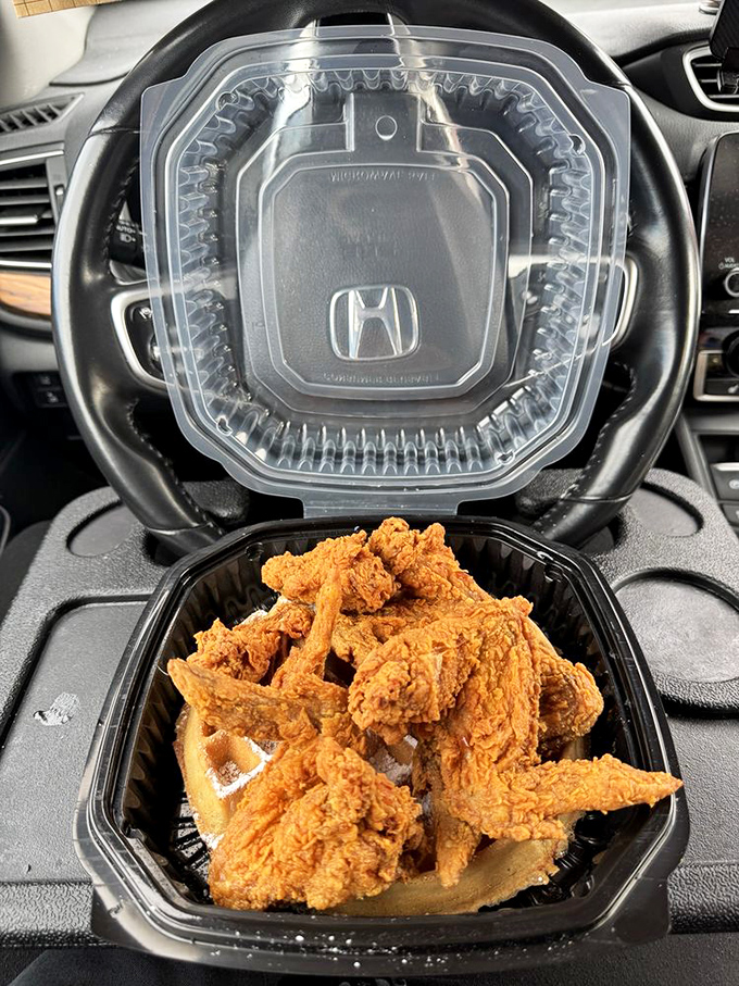 Car dining at its finest – this chicken and waffle combo turns your Honda into a five-star restaurant. Steering wheel: now the world's best dining table.