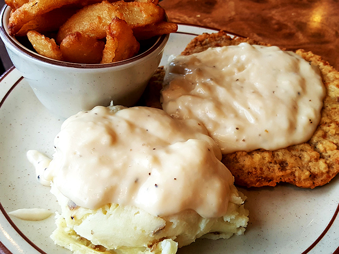Comfort food that hugs you from the inside. Those potatoes look like they've been fried by someone who truly understands the meaning of life.
