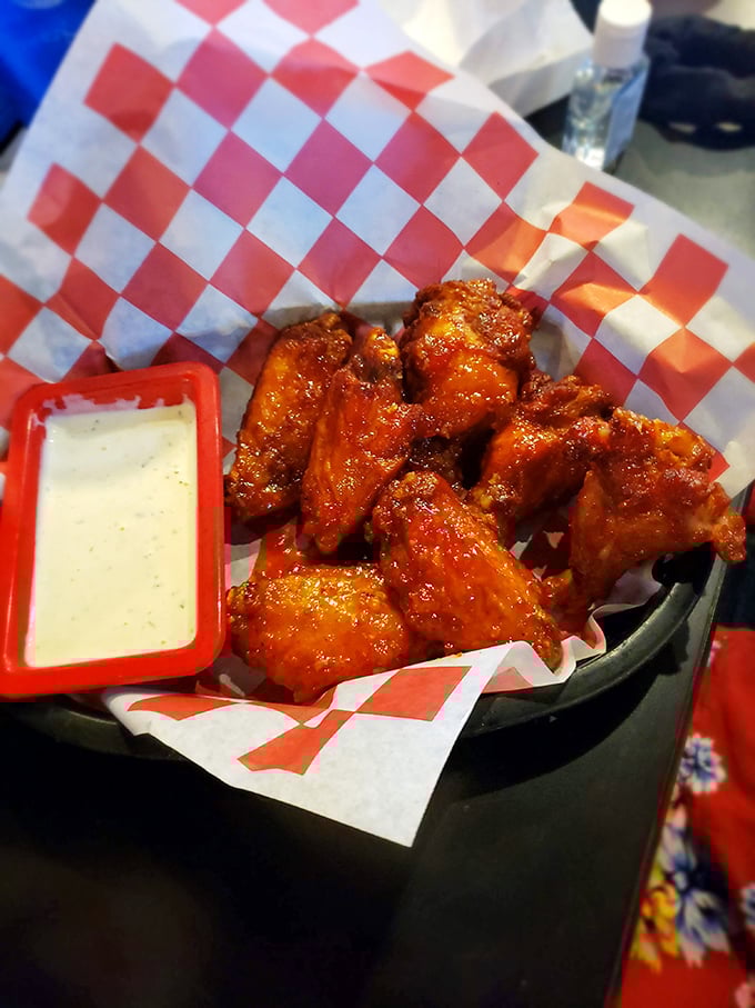 These wings aren't messing around—glossy, saucy, and served with that essential side of ranch, they're the Thursday night tradition Nebraska deserves.