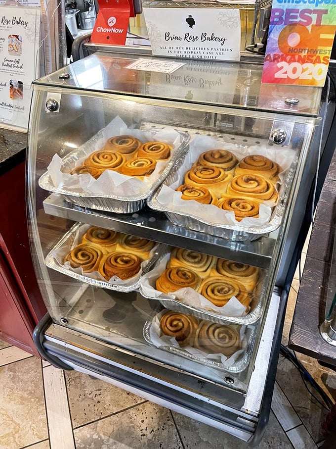 Cinnamon roll central! These unfrosted spirals await their final transformation, like Broadway understudies ready for their star-making moment.
