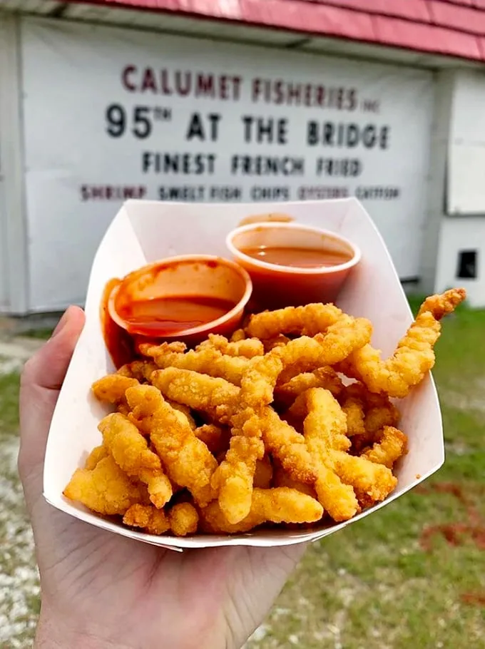 Happiness comes in a paper boat! These golden-battered shrimp are what seafood dreams are made of—simple, perfect, unforgettable.