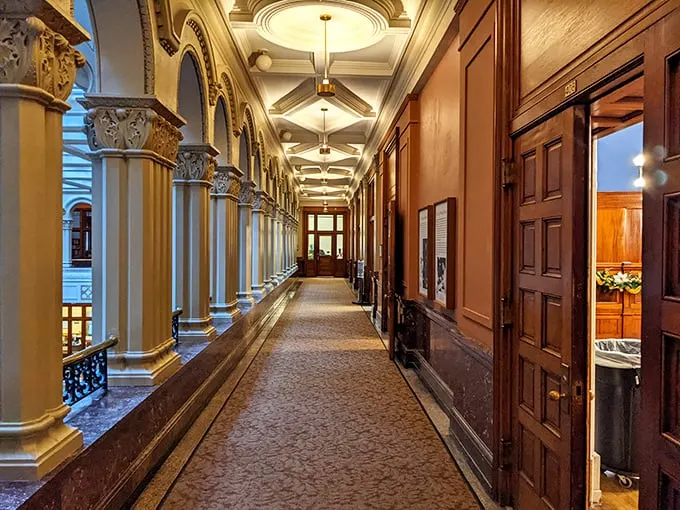 Corridors that whisper secrets of the past—each marble column and ornate doorway has witnessed a century of American history.