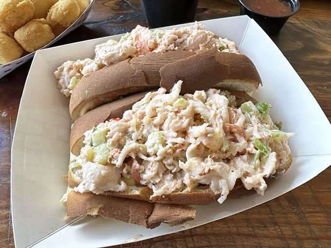 Lobster roll perfection that would make even a New Englander pause mid-sentence. That generous portion isn't showing off—it's just Midwest hospitality in sandwich form.