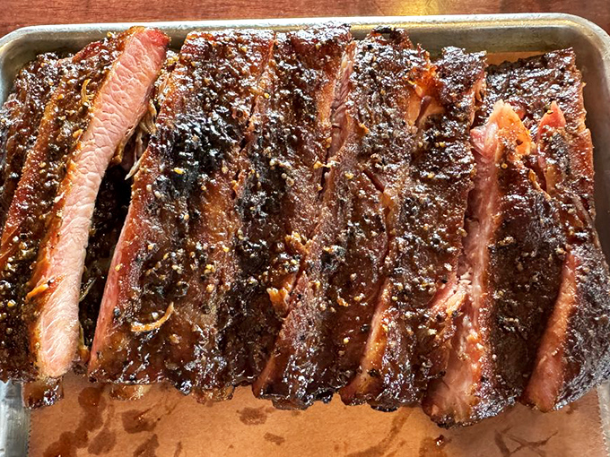 Not all heroes wear capes—some wear smoke rings. These ribs display the telltale pink boundary that separates barbecue amateurs from masters.