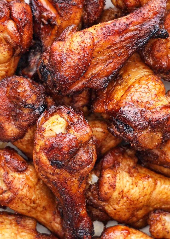 These chicken wings aren't just cooked – they're transformed. That mahogany skin promises a crunch that'll make your knees buckle with joy.