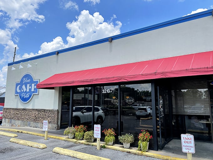 Blue Plate Cafe's cheerful exterior is like a morning pep talk—"Come on in, the grits are fine, and your coffee cup will never be empty."