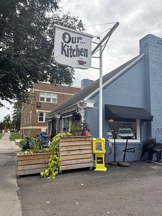 Our Kitchen: Tiny blue building, enormous flavor! This Minneapolis micro-diner proves greatness doesn't require square footage—just perfect pancakes and passion.