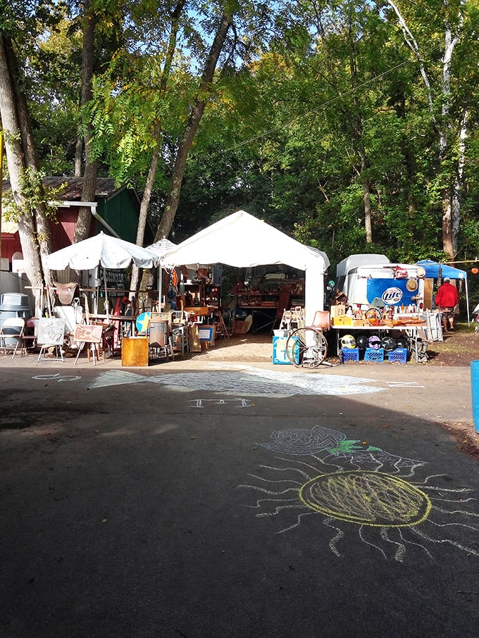 Nature provides the backdrop for this treasure hunt. Chalk art on pavement marks the spot where memories are bought and sold.