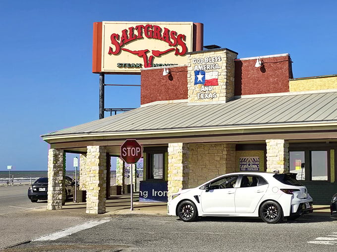 That red sign promises legendary steaks with a side of Gulf breeze – beef and beach, together at last.
