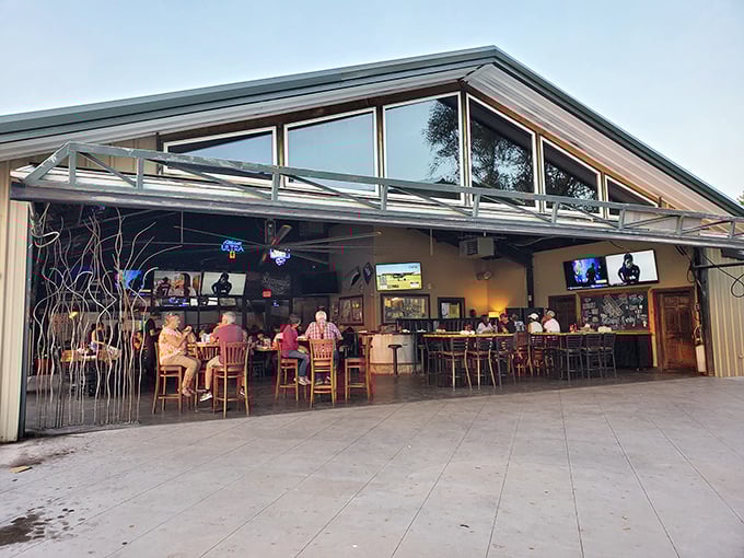 The open-air bar at Stearman Field offers front-row seats to the runway show. Plane-spotting and beer-sipping—a perfect Kansas afternoon!