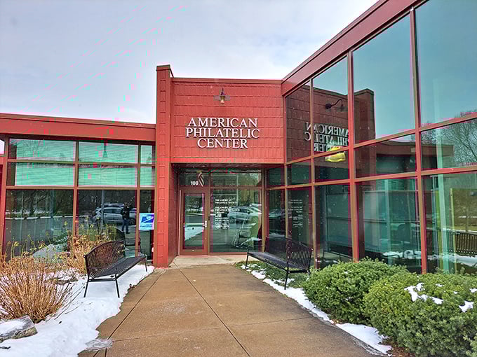 The American Philatelic Center: where stamp collectors get more excited than kids in a candy store. Even the building's bold red exterior refuses to be overlooked.