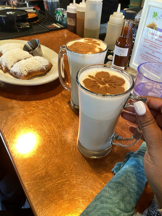 Powdered sugar beignets and spiced chai lattes – the breakfast combo that makes Monday feel like Saturday. New Orleans meets India in Denver.