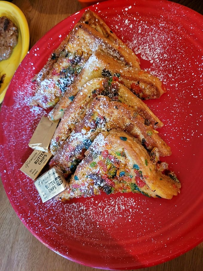 Golden-brown French toast sticks standing at attention, ready to be dipped in syrup—breakfast finger food at its finest.