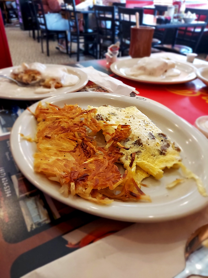 When an omelet meets perfectly executed hash browns, it's not just breakfast—it's a morning masterpiece worthy of your Instagram and your appetite.