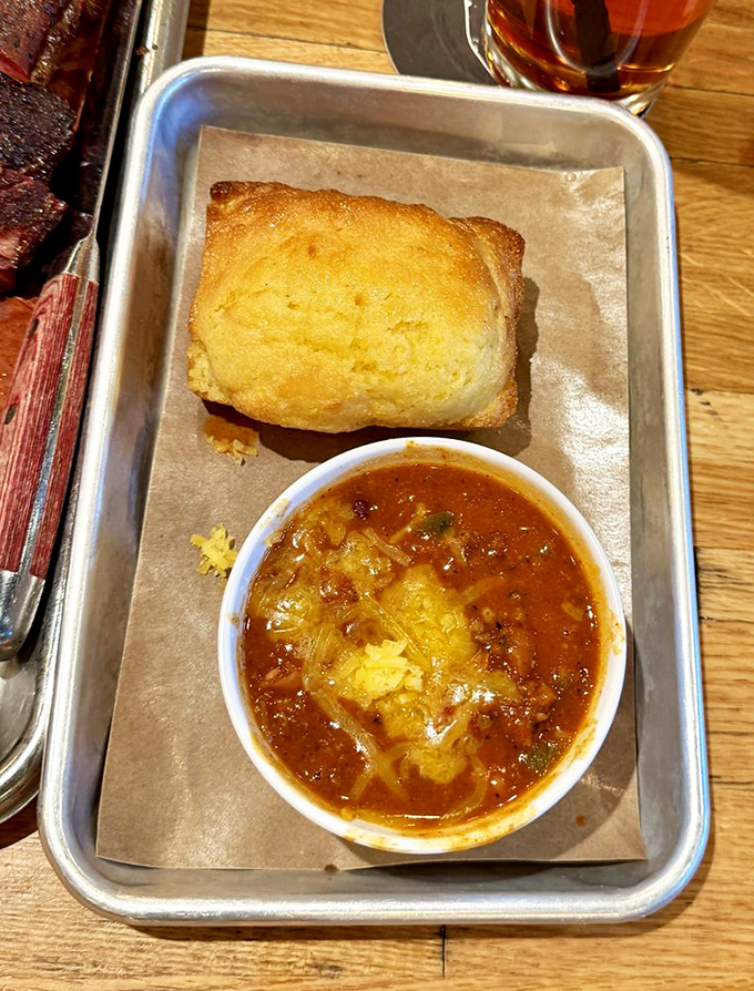 Cornbread and chili—the Fred Astaire and Ginger Rogers of comfort food. They're each wonderful alone, but together? Pure magic on a metal tray.