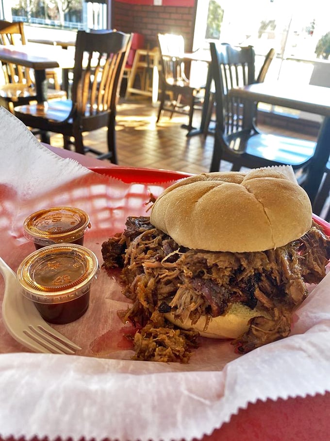 This sandwich isn't just overstuffed—it's having an existential crisis about containing so much perfectly smoked brisket in mere bread.