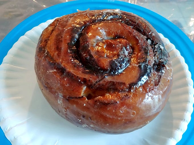 The cinnamon swirl—hypnotic in its perfection. Like the architectural lovechild of a Swiss roll and a meteorite, with flavor that defies gravity.