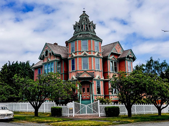 The Ann Starrett Mansion flaunts its Victorian flamboyance like a colorful character in a Wes Anderson film—proof that architectural restraint wasn't always a Pacific Northwest value.