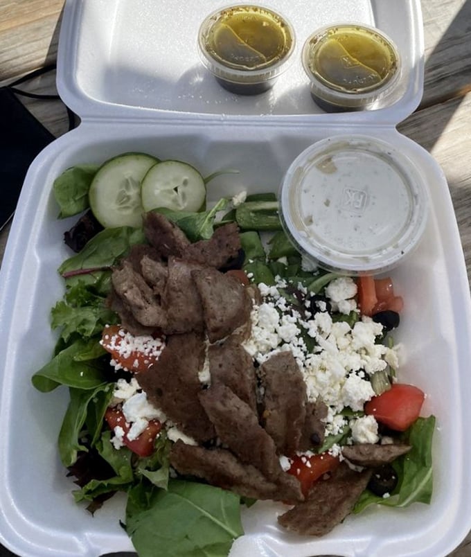 Who said salads can't be exciting? This Greek salad topped with gyro meat is the superhero of lunch options – nutritious yet indulgent.