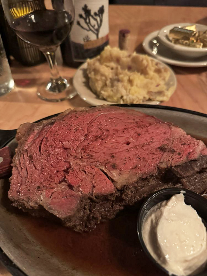 If beef could dream, it would aspire to this level of perfection – a prime rib slice that's practically posing for its glamour shot with horseradish sidekick.