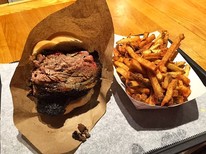 This brisket sandwich isn't just lunch—it's an event. Those fries aren't sides; they're supporting actors in a meaty drama.