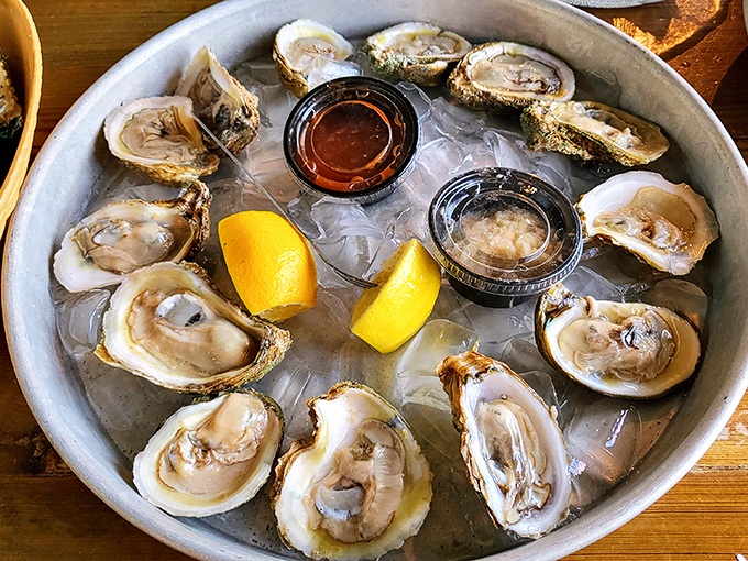 These oysters aren't just served—they're presented like pearls on ice, waiting to slide down your throat with a splash of lemon and hot sauce.