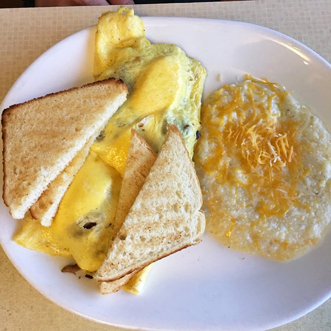 The Philly Steak Omelet: where breakfast meets lunch in a harmonious marriage. Grits with cheese on the side? That's the Southern hospitality we're here for.
