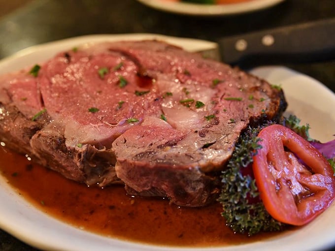 Prime rib cooked to that perfect rosy medium-rare – the kind that makes conversation stop and eyes close in pure appreciation.
