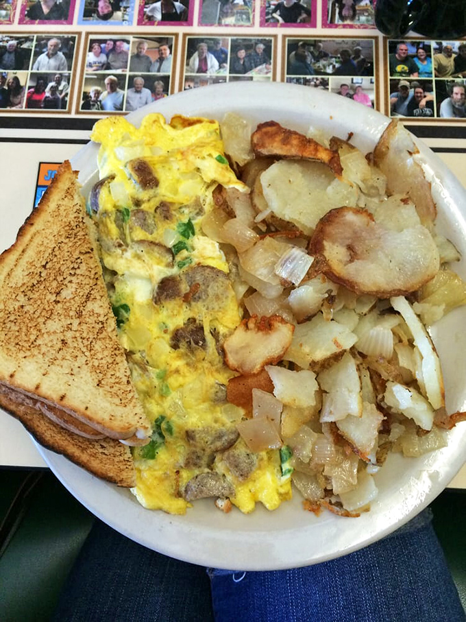 This Western omelet and home fries combo doesn't need fancy plating – it's too busy stealing the show with flavor. Note the perfectly caramelized onions.