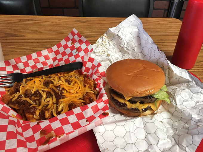 The quintessential American burger with melty cheese and chili – solving life's problems one perfectly grilled patty at a time.