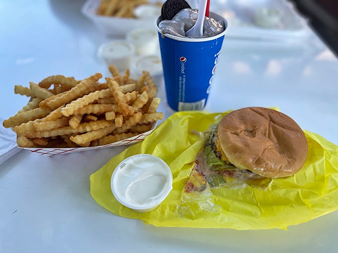 Crinkle-cut fries that could make a French culinary school graduate weep with joy, paired with a burger that doesn't need Instagram filters.