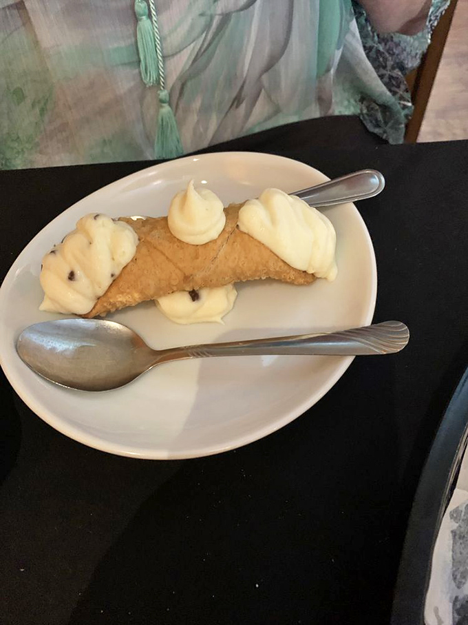 This cannoli isn't just dessert—it's an edible work of art. Crisp shell, creamy filling, and a reason to save room no matter how full you are.