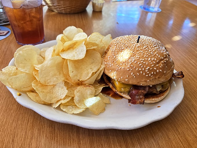 A proper diner burger doesn't need fancy aioli or artisanal buns—just honest beef, melty cheese, and enough napkins to handle the situation.