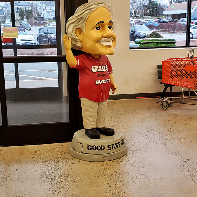 Meet the unofficial greeter of Ollie's—a mascot whose permanent smile suggests he knows exactly how much you're about to save.