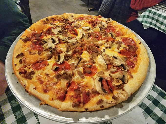 Pizza that respects tradition while satisfying modern appetites – the kind that makes you wonder why you ever bothered with those trendy artisanal places.