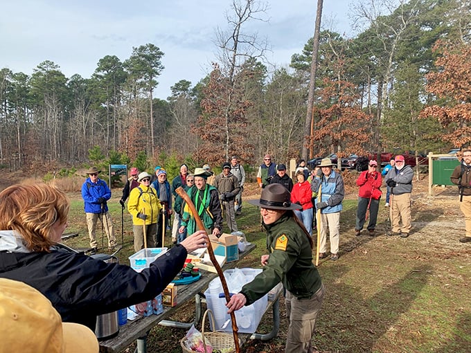 Park rangers sharing nature's secrets! These guided programs turn a simple walk in the woods into a fascinating journey through Arkansas's natural history.
