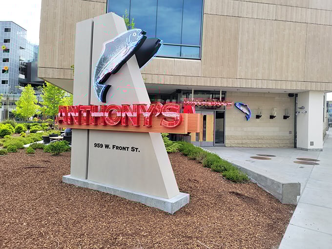 Anthony's makes a statement before you even enter – that fish sculpture is just a preview of the seafood artistry waiting on your plate inside.