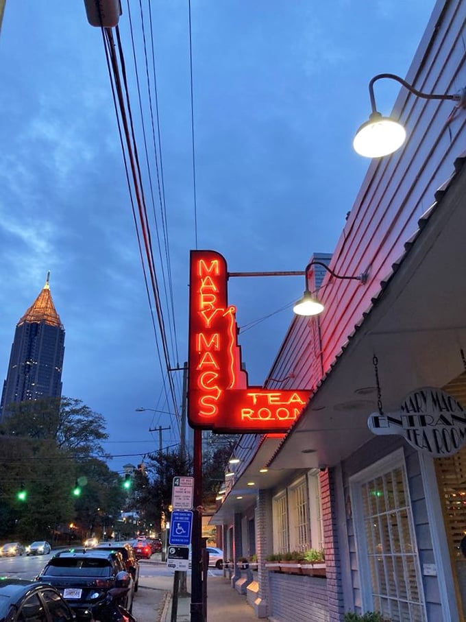 Mary Mac's Tea Room: When the Atlanta skyline meets that glowing red sign at dusk, you know you're about to experience Southern food royalty.
