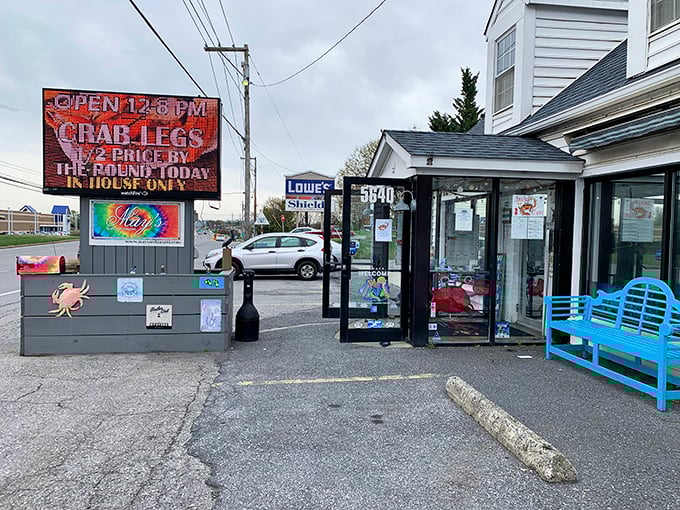 That colorful mural isn't compensating for anything—the seafood inside May's is every bit as vibrant as its paint job.