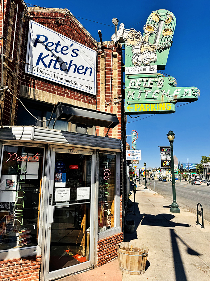 Sunshine illuminates the legendary Pete's Kitchen sign in all its glory. This Denver landmark proves that sometimes the best seafood comes from the most unexpected places.