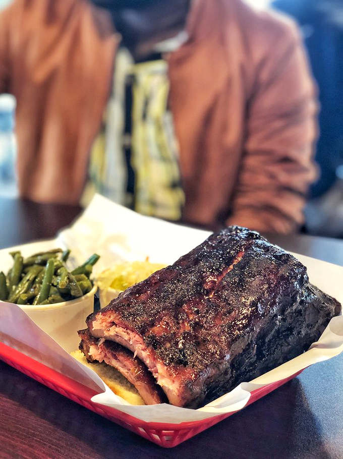 Wrapped in foil like the precious gift it is, this rack of ribs has the kind of bark that makes barbecue enthusiasts weak at the knees.