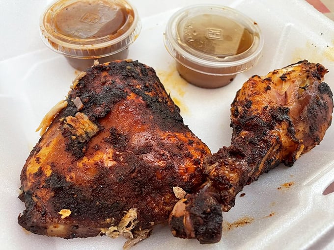 Chicken that's clearly had a meaningful relationship with smoke and spices. The burnished skin is basically meat candy.