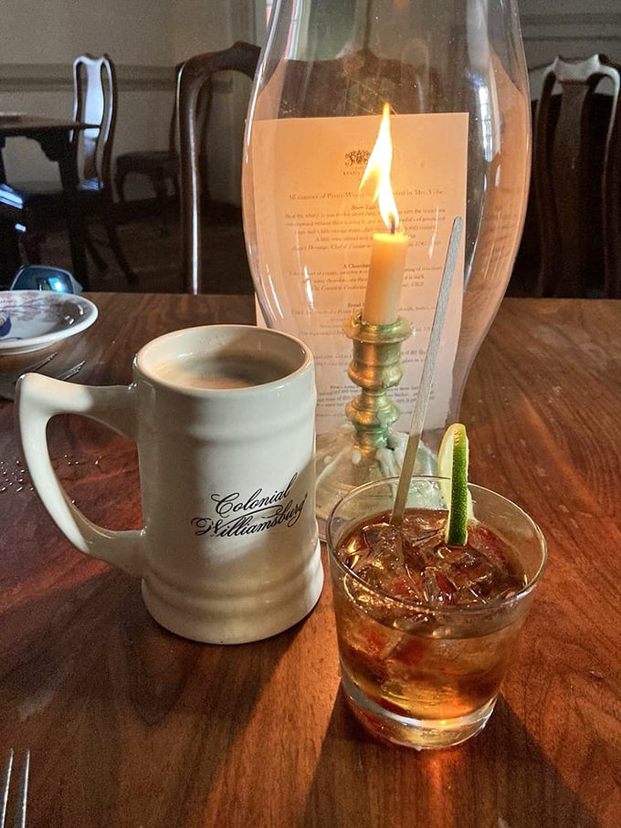 Colonial mixology at its finest—where your drink arrives alongside a flickering candle, making even a simple cocktail feel like a revolutionary act.