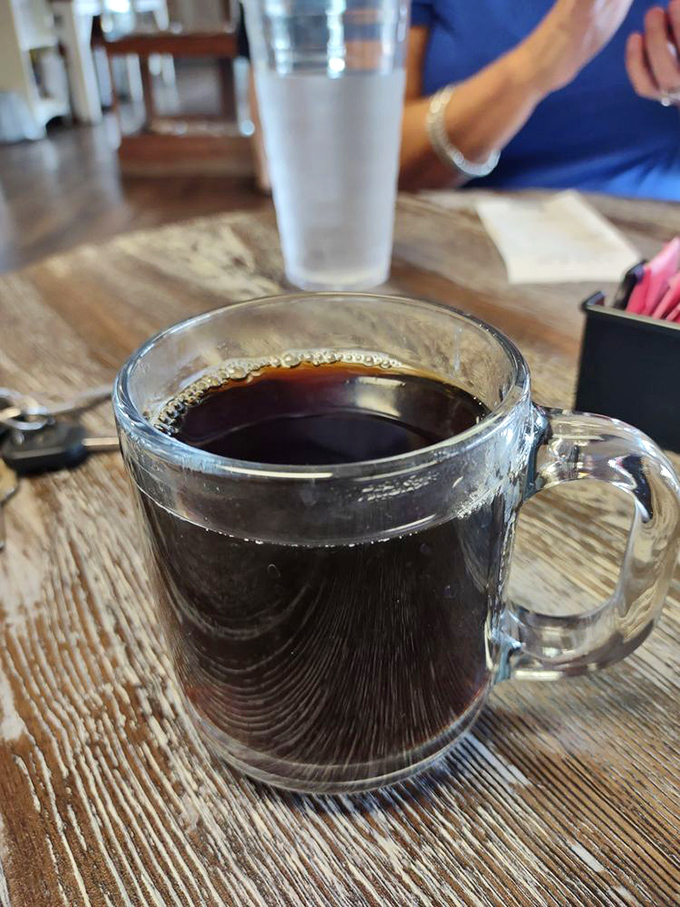 Strong coffee in a clear mug—the perfect companion to cut through the sweetness of pie. A necessary counterpoint to dessert bliss.