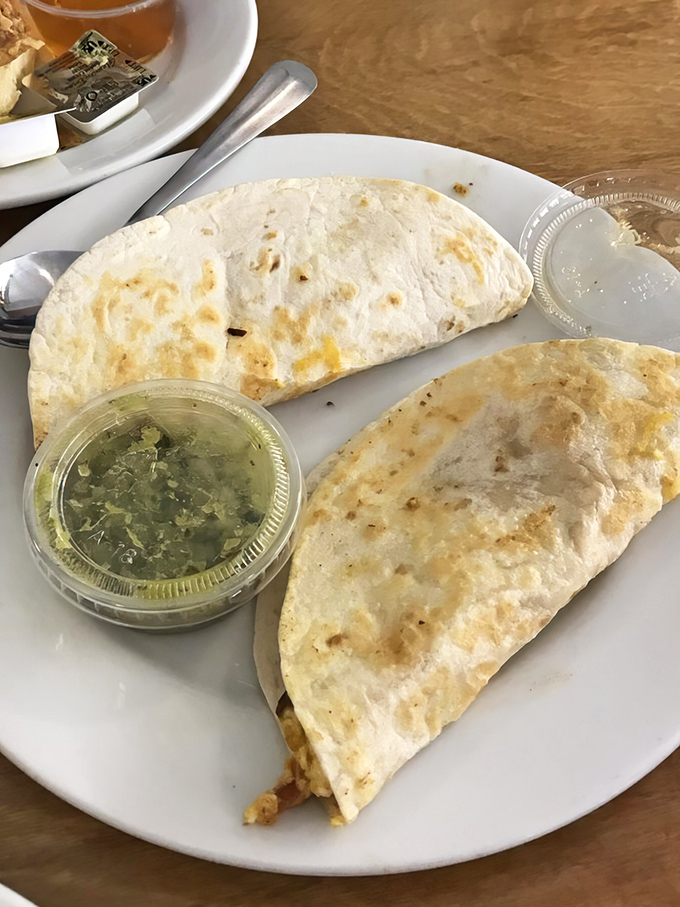 These breakfast tacos aren't trying to be authentic—they're trying to be delicious. Mission accomplished, with salsa to spare.