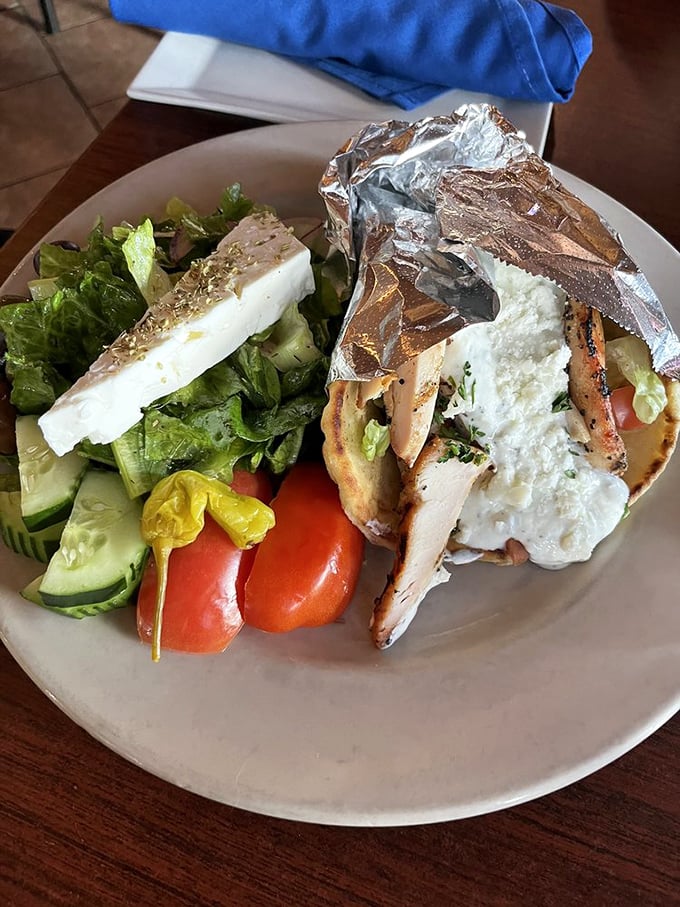 The chicken gyro with Greek salad – proof that healthy choices don't require taste sacrifices. This plate has more Mediterranean vibes than my last vacation.