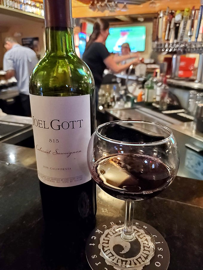 A glass of Joel Gott Cabernet at the bar – because sometimes adulting means pairing your pasta with something more sophisticated than soda.