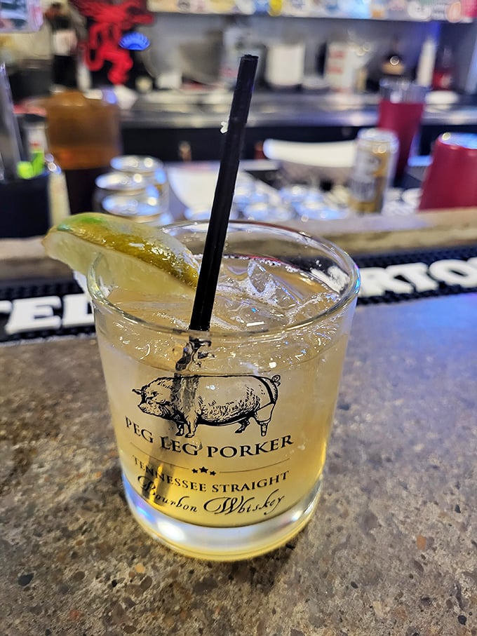 Their signature cocktail served in a branded glass – because even your drink deserves to be part of the Peg Leg Porker experience.